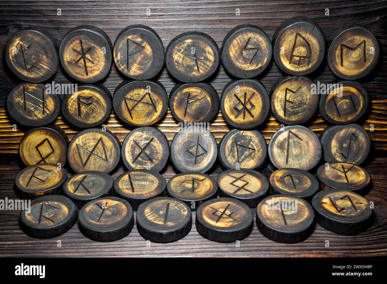Runes carved from wood on the vintage wood background, Anglo-Saxons ...