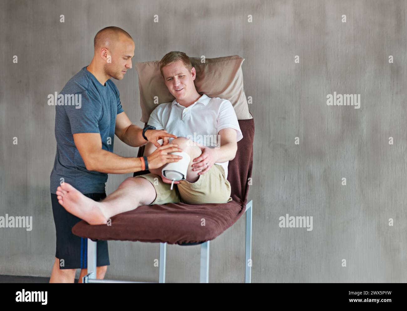 Man with prosthetic legs in hospital hi-res stock photography and ...
