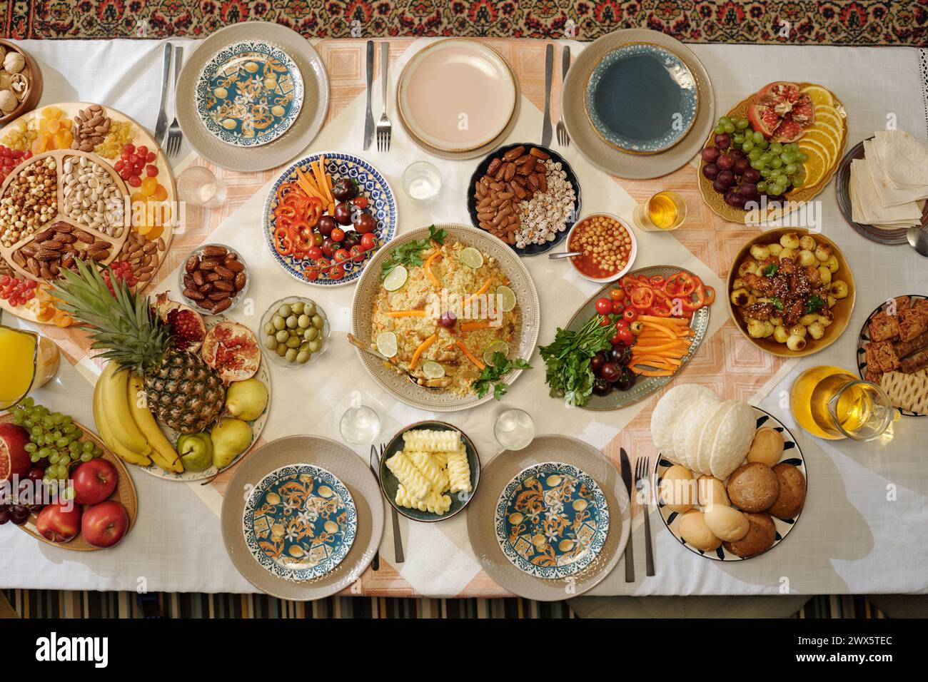 Top-down flat lay shot of abundant festive table served with homemade ...