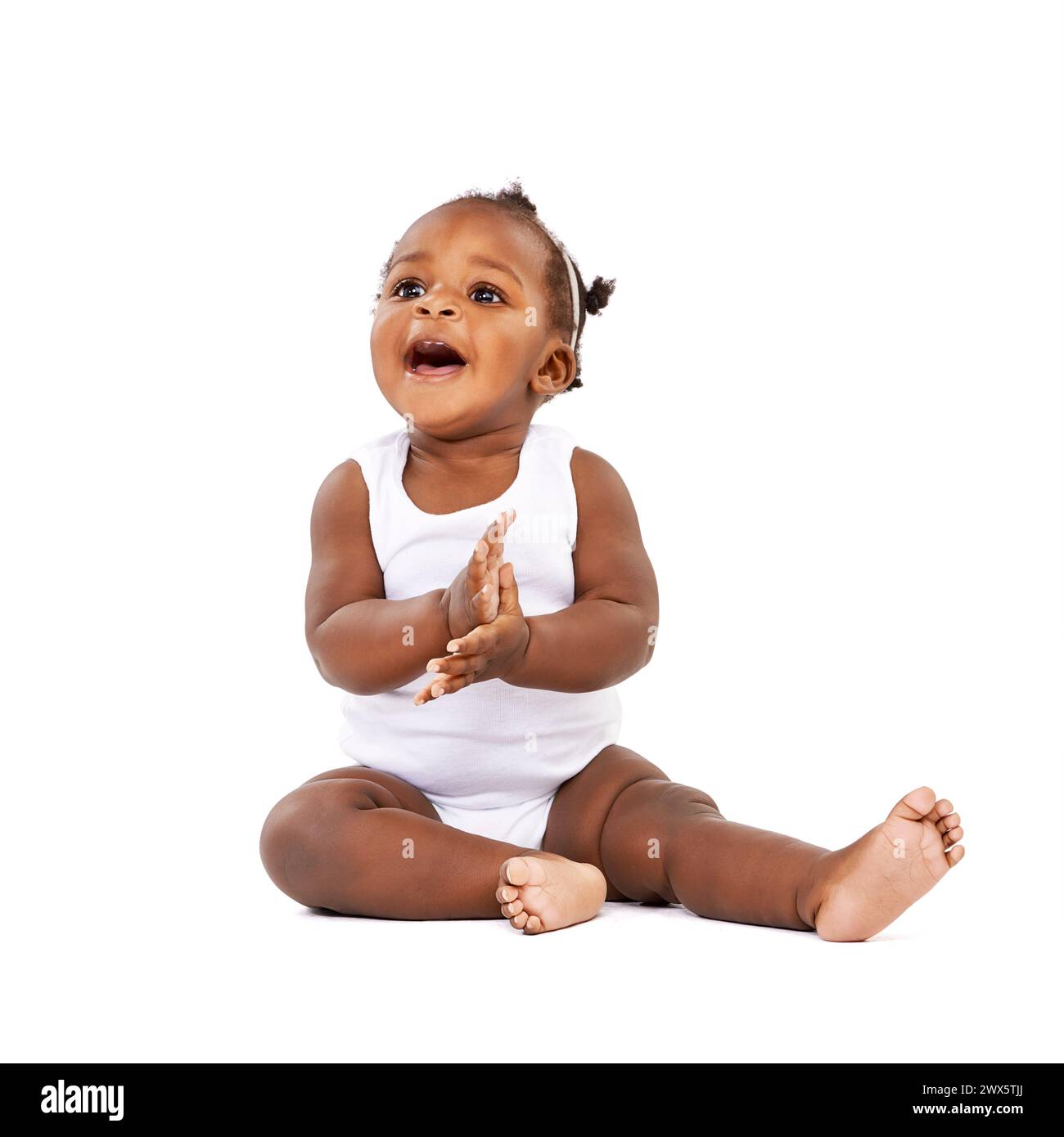 Infant, black girl and clapping in studio for happiness, growth and ...