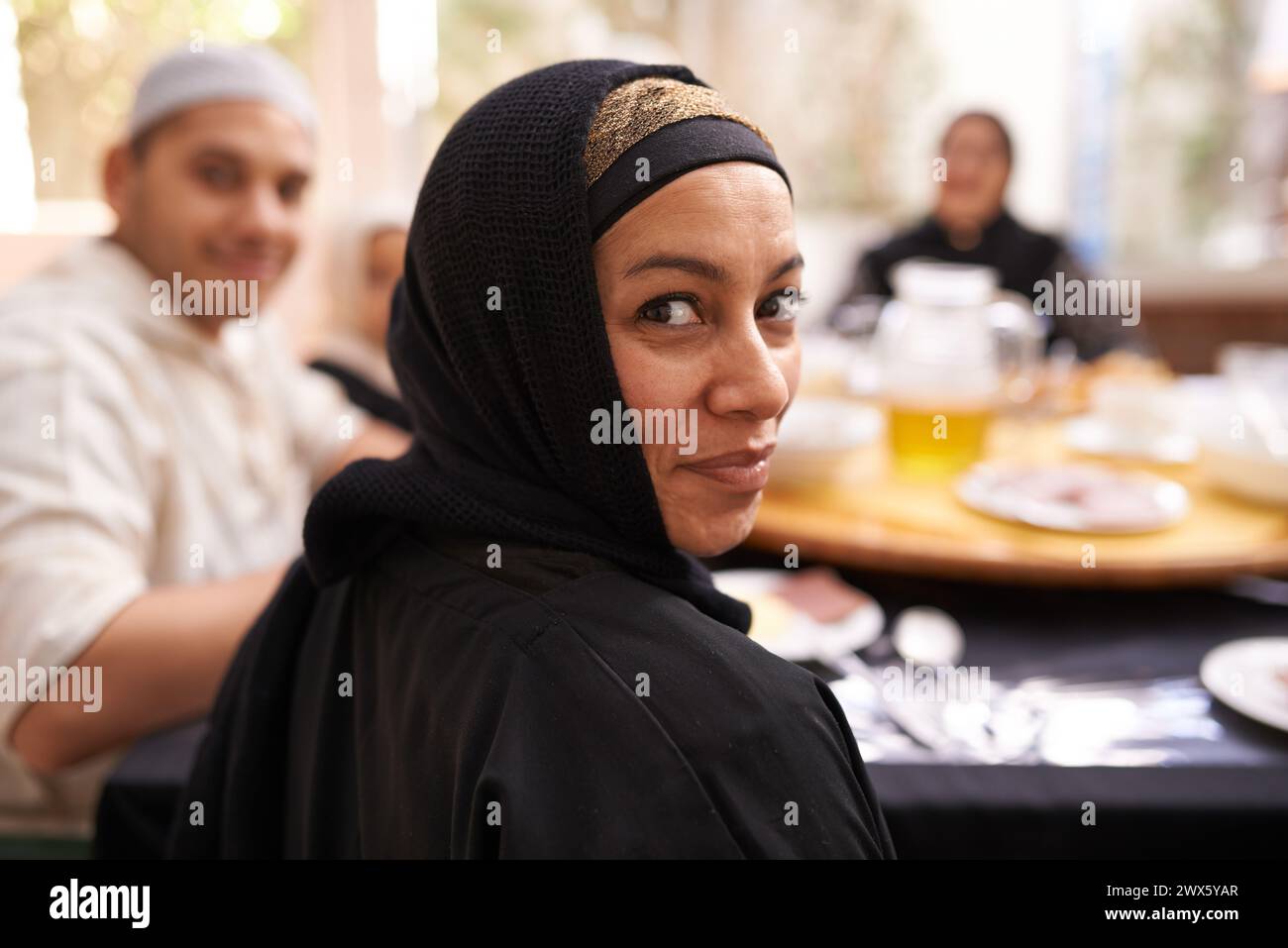 Muslim woman, portrait and family in house with dinner, celebration and ...