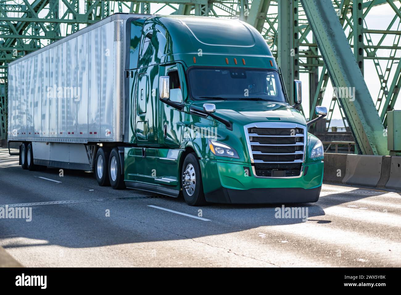 Industrial carrier long hauler green big rig semi truck tractor with ...