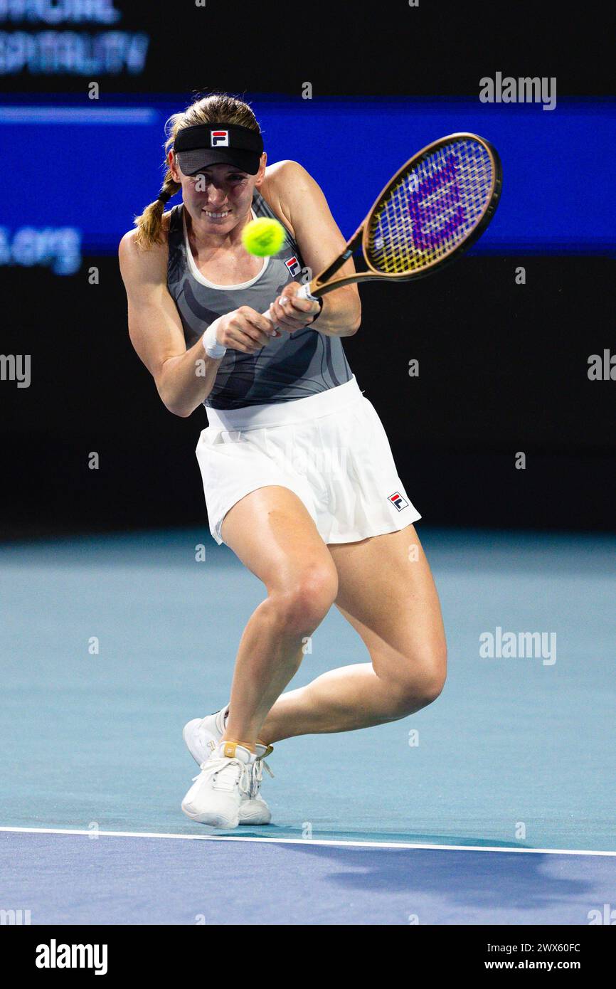 MIAMI GARDENS, FLORIDA - MARCH 27: Ekaterina Alexandrova serves against ...