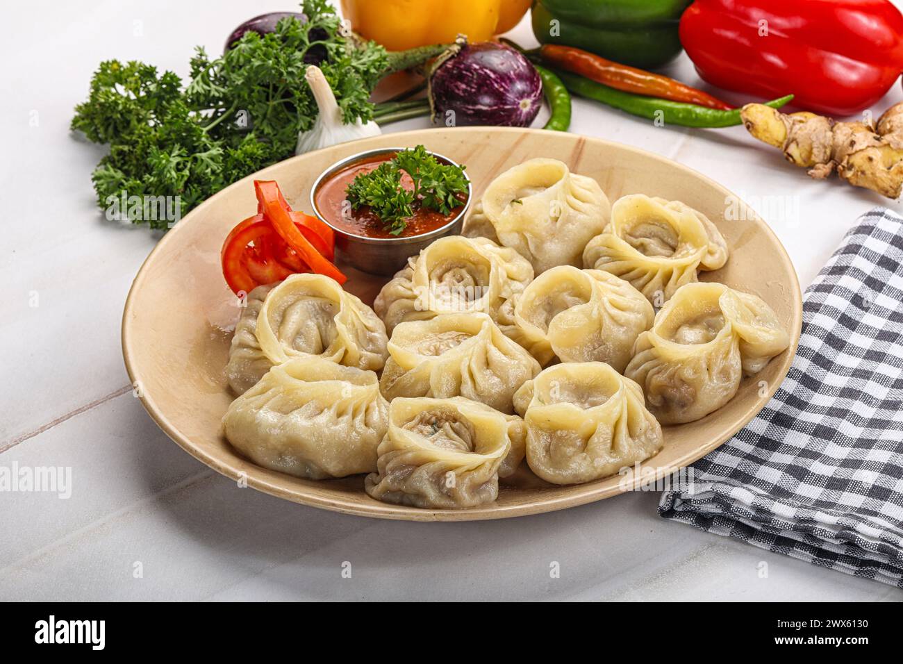 Steamed Nepali dumpling Momo with sauce stuffed chicken, meat, seafood ...
