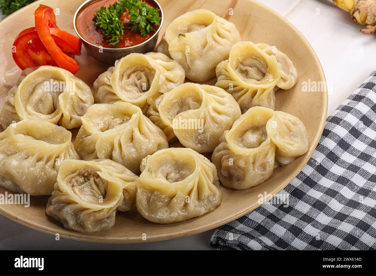Steamed Nepali dumpling Momo with sauce stuffed chicken, meat, seafood ...