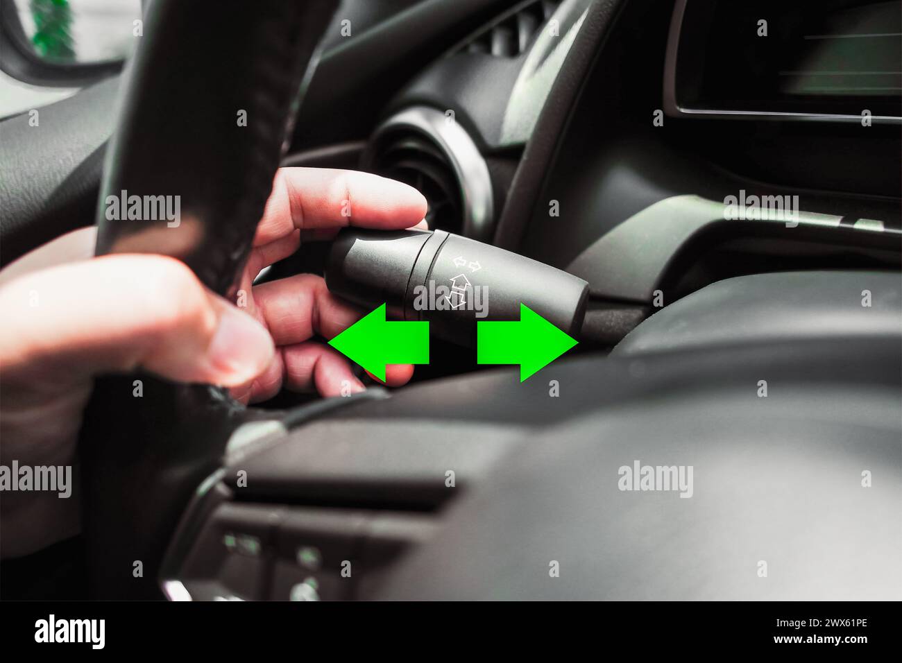 Driver hand using turn signal in a car , Vehicle driving concept Stock ...