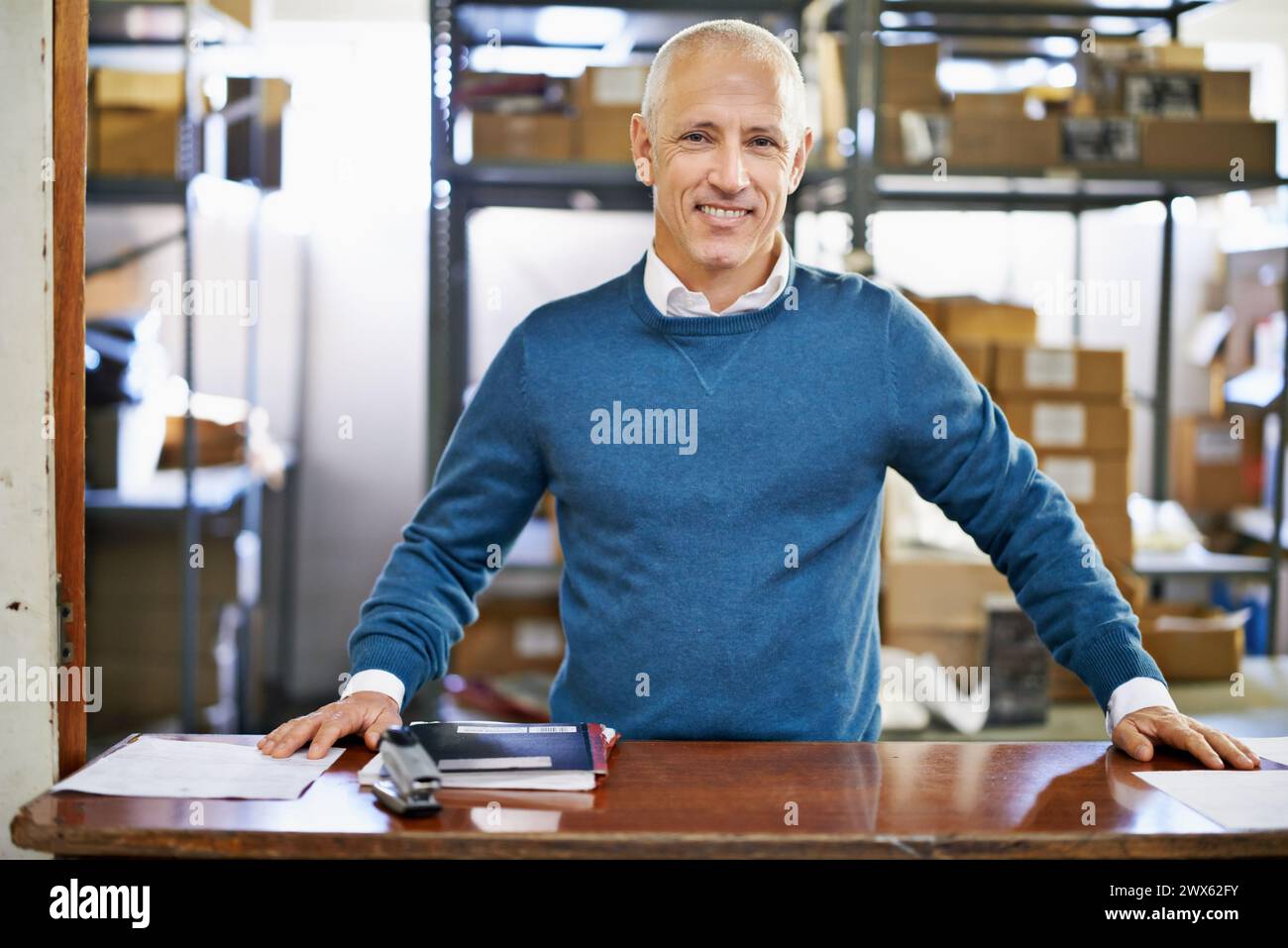Man, portrait and logistics in warehouse with smile for manufacturing ...