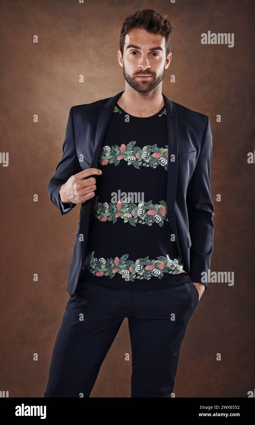 Spanish male, model and fashion portrait in studio, stylish and ...