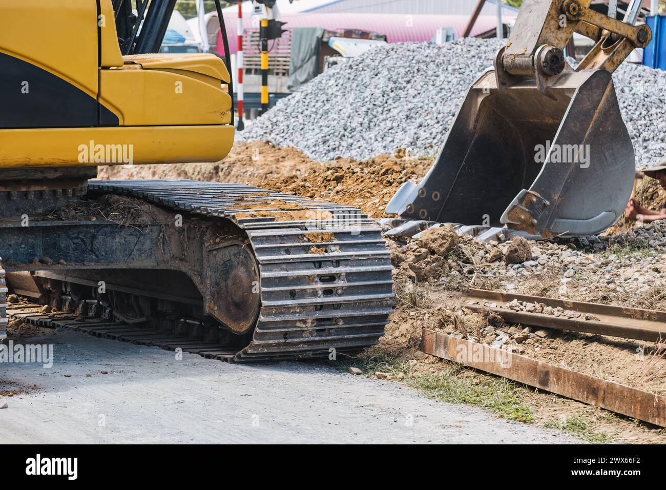 Excavator or backhoe scoop earth moving and digging soil and stone on ...