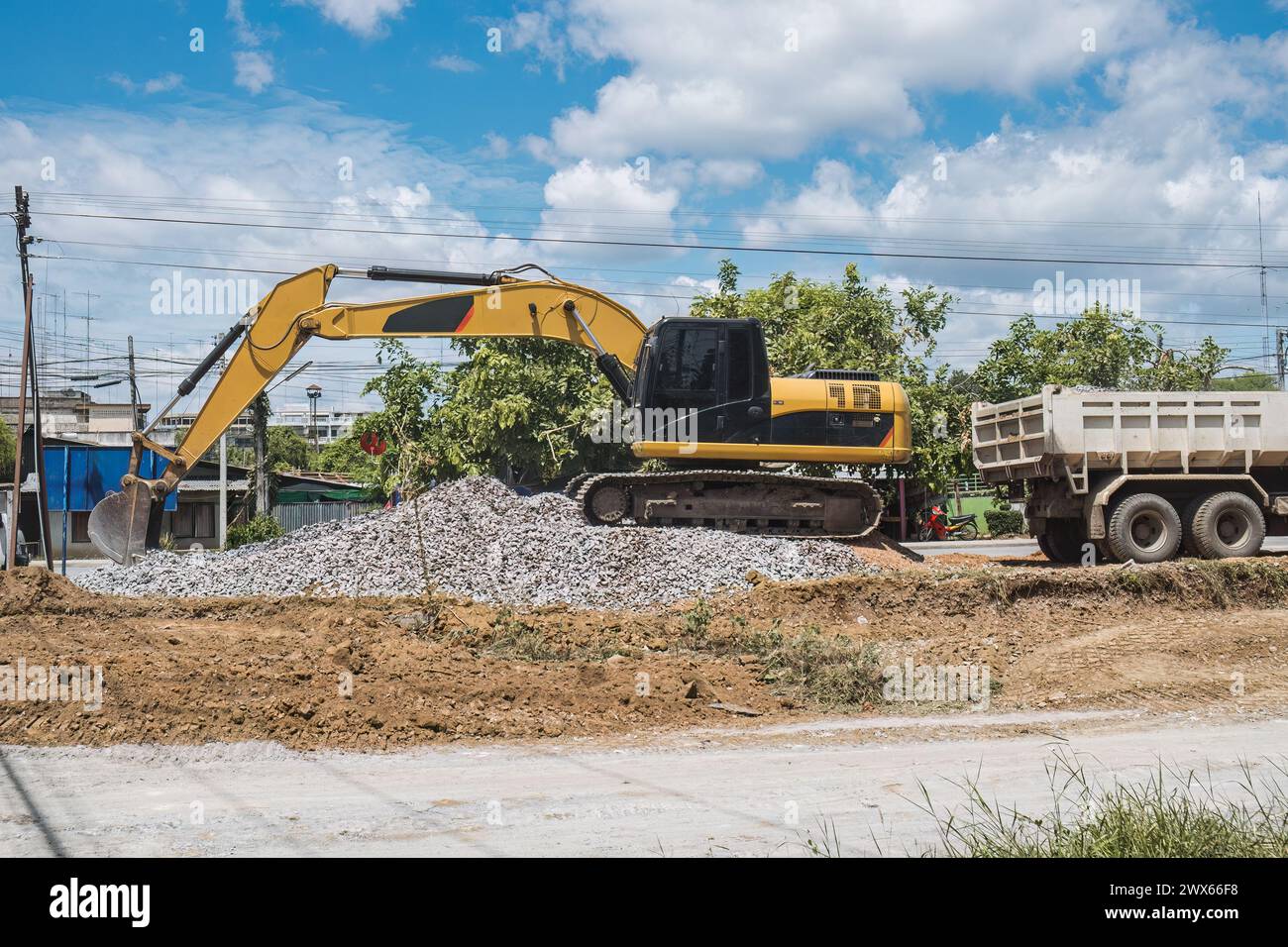 Excavator or backhoe scoop earth moving and digging soil and stone on ...