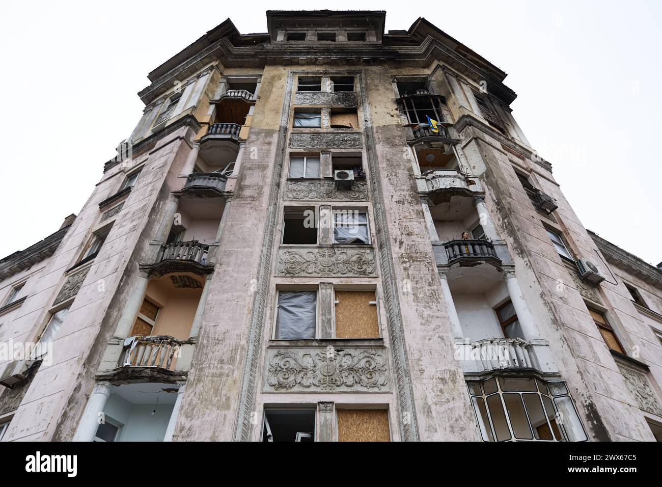 Destroyed Ukrainian house with boarded up and shattered windows after ...