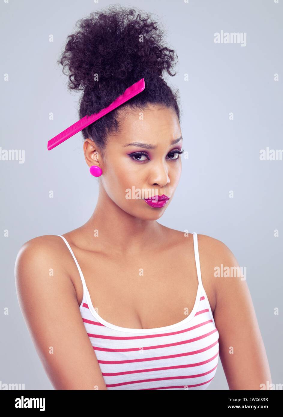 Portrait, comb and black woman with hair care, beauty and cosmetology ...