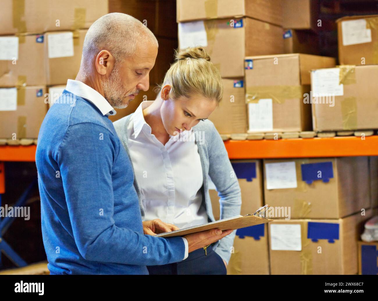 Logistics, teamwork or clipboard in warehouse with inventory for quality control, service ...