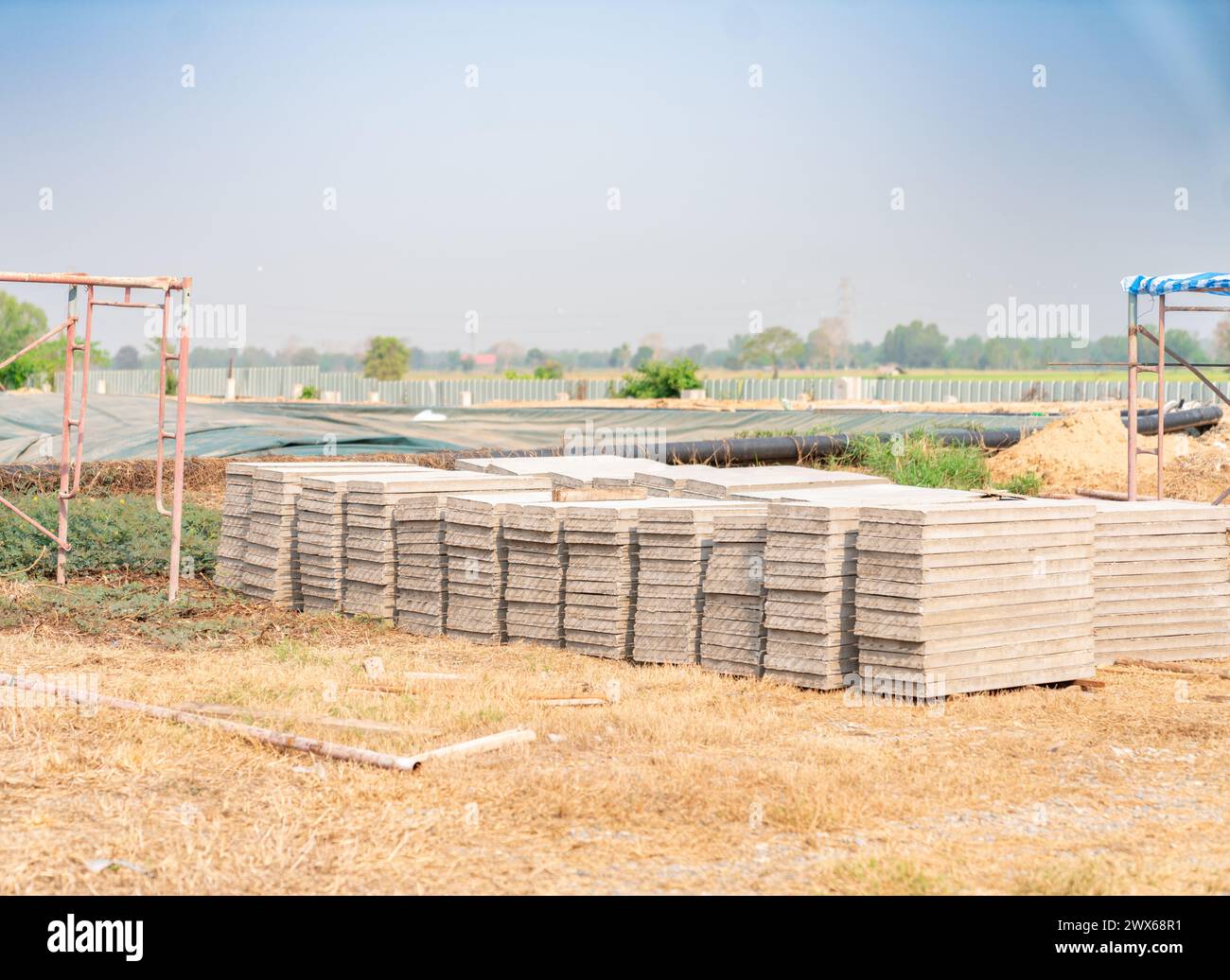 Precast concrete hard slab planks stacked on the construction site ...