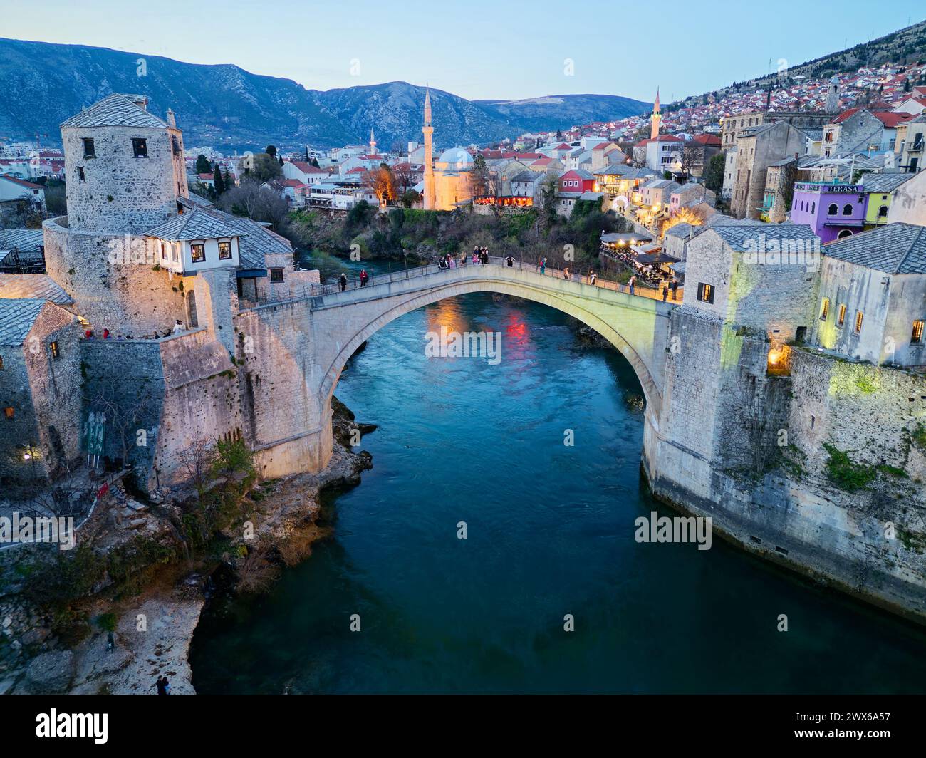 Twilight view of the Old Bridge in Mostar city in Bosnia and ...
