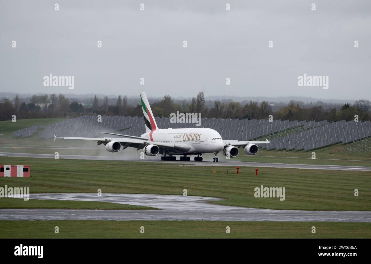Emirates Airlines Airbus A380 landing at Birmingham Airport in wet ...