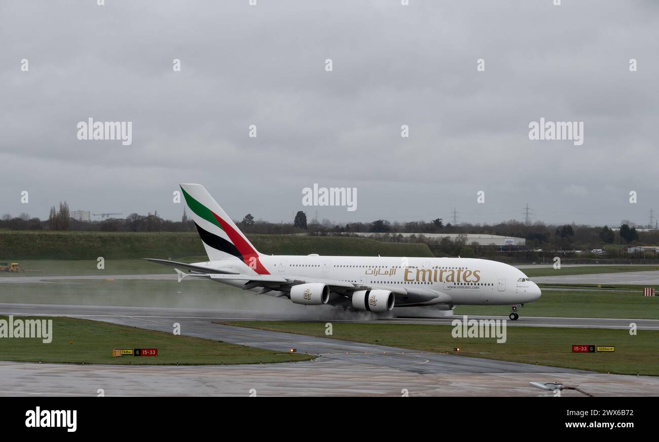 Emirates Airlines Airbus A380 landing in wet weather at Birmingham ...