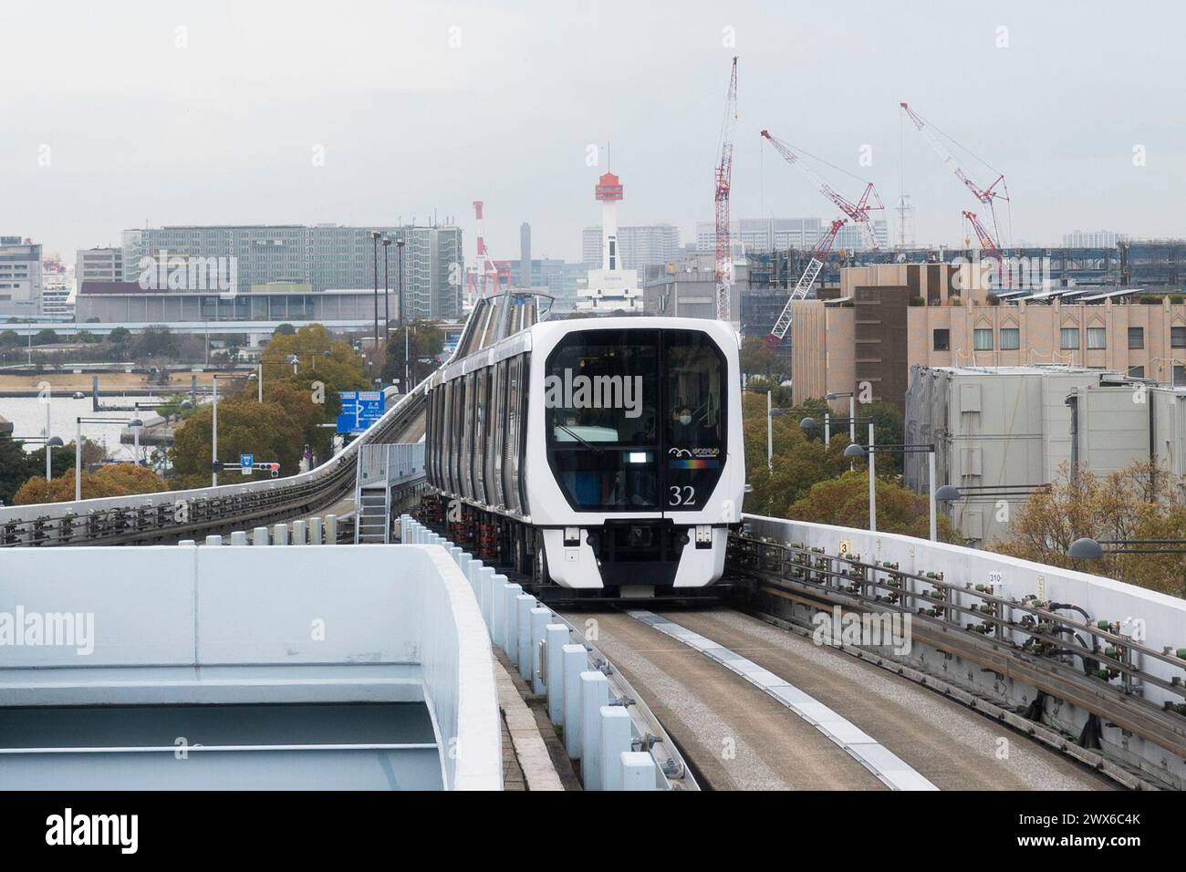 Tokyo, Japan. 28th Mar, 2024. The Yurikamome-sen train line arriving at ...