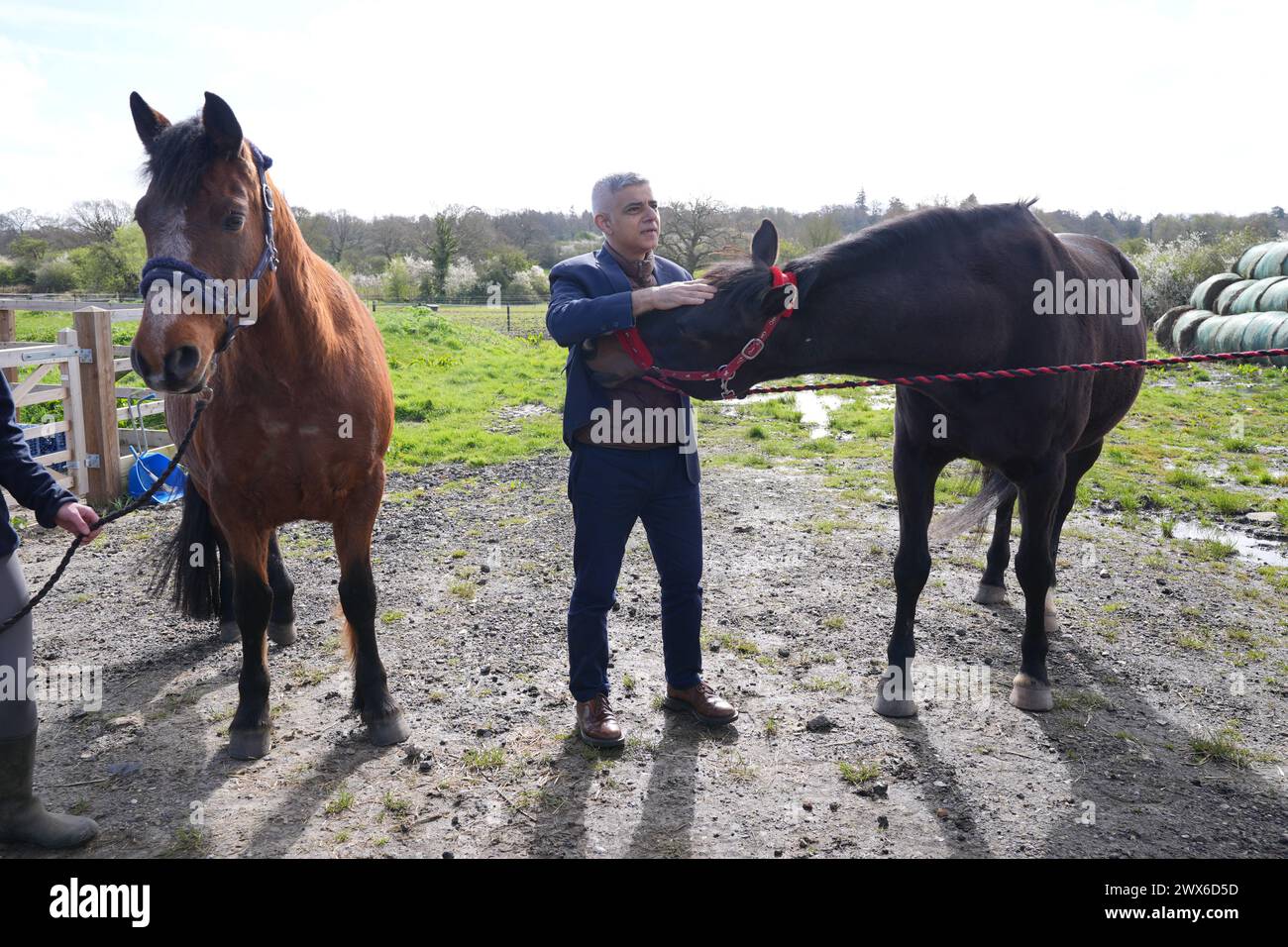 Mayor of London Sadiq Khan meets volunteers and horses during a visit ...