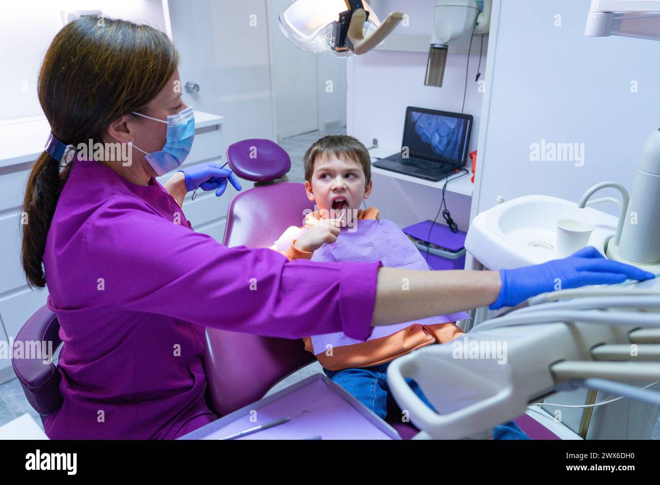 boy brushing teeth at the dentist Stock Photo - Alamy