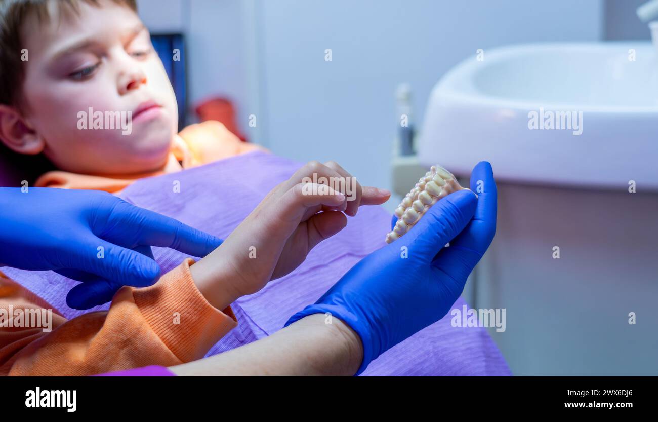 Boy pointing at tooth hi-res stock photography and images - Alamy