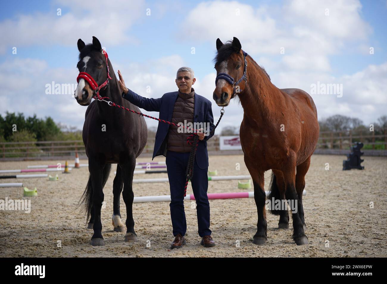 Mayor of London Sadiq Khan meets volunteers and horses (Prince, left ...