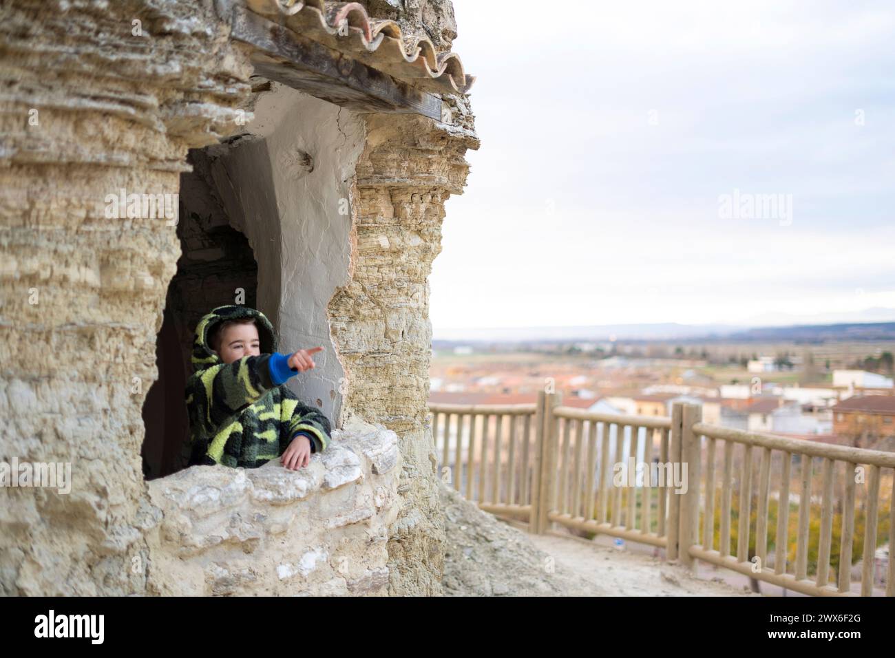 Boy in a cave house Stock Photo - Alamy