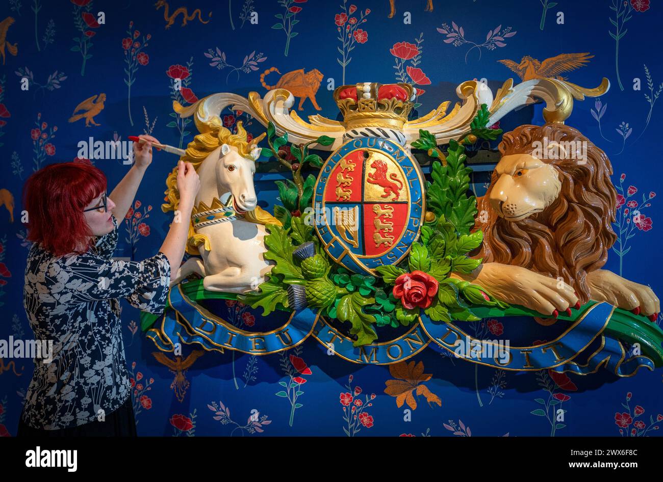 Conservation officer Anna Zwagerman cleans Queen Victoria's Coat of ...