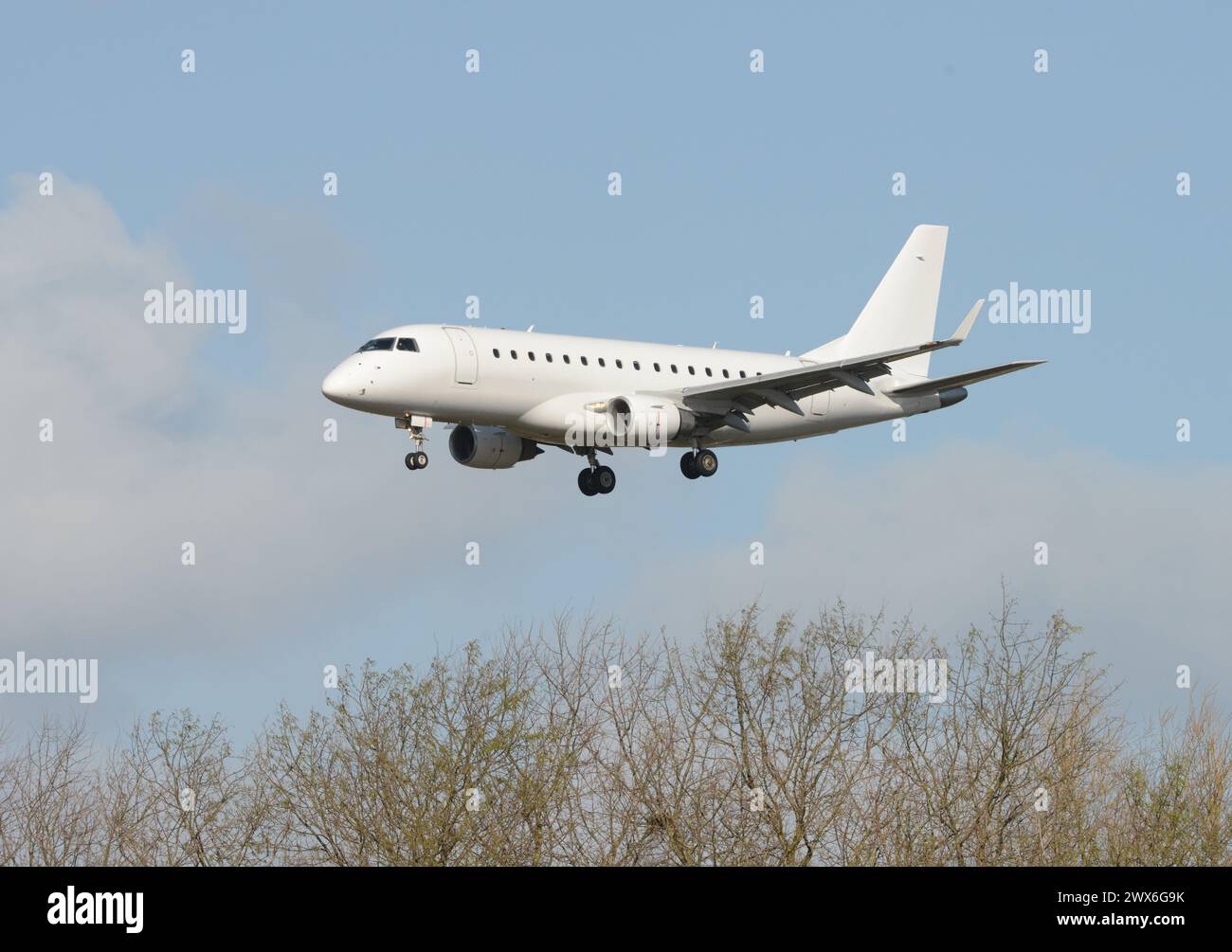 EASTERN AIRWAYS EMBRAER E-190 G-CMLI approaching runway 27 at LIVERPOOL ...