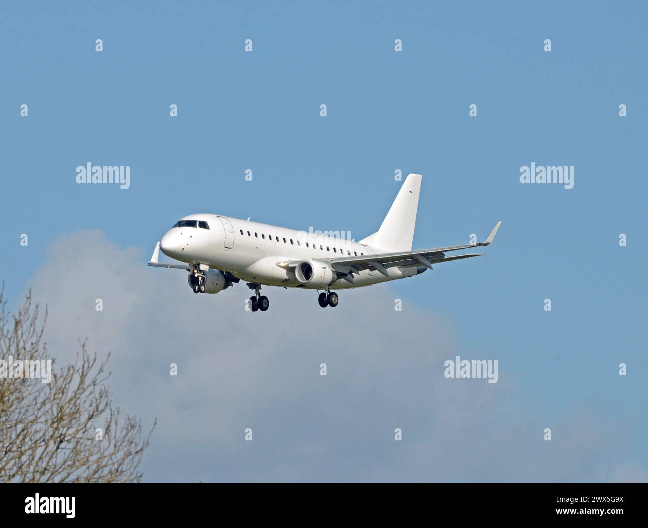EASTERN AIRWAYS EMBRAER E-190 G-CMLI approaching runway 27 at LIVERPOOL ...
