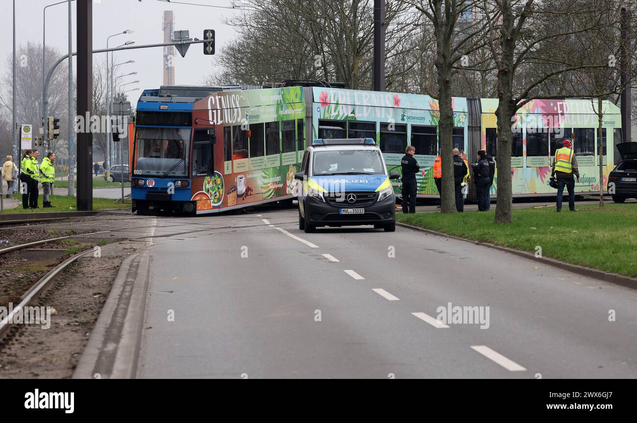 Rostock, Germany. 28th Mar, 2024. A derailed streetcar is blocking the ...