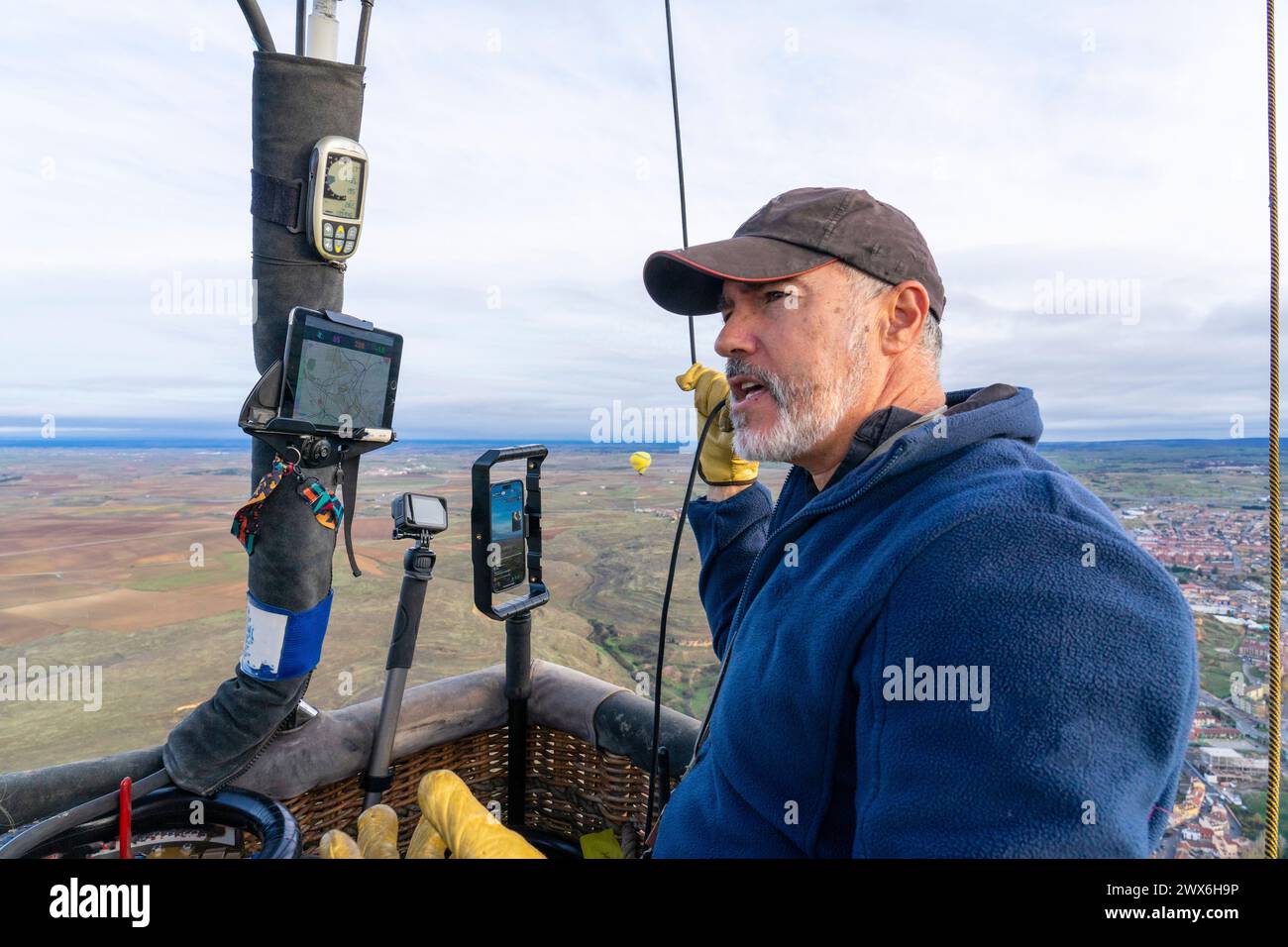 Hot air balloon pilot piloting a balloon Stock Photo - Alamy