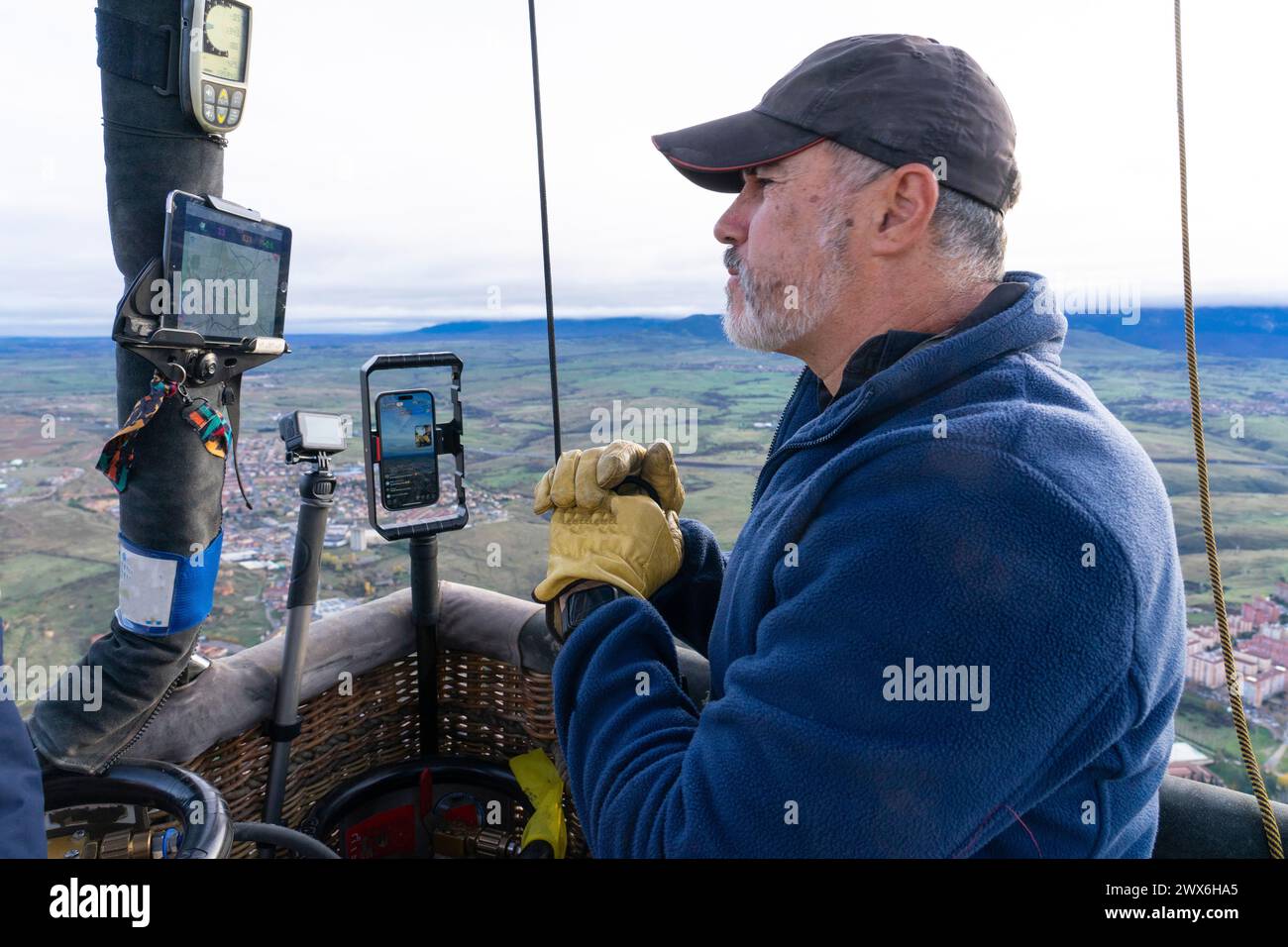 Hot air balloon pilot piloting a balloon Stock Photo - Alamy