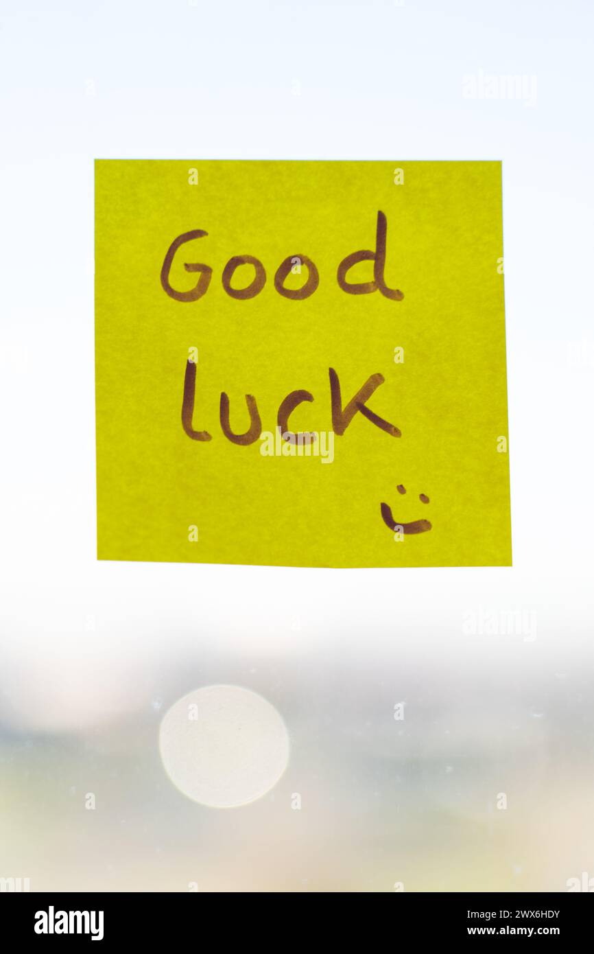 Good luck written on a post it Stock Photo - Alamy