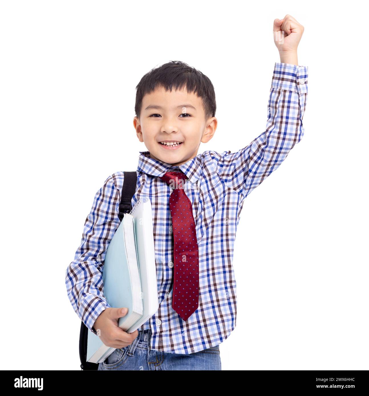 Back to school. Happy Schoolboy student raising the arm Stock Photo - Alamy