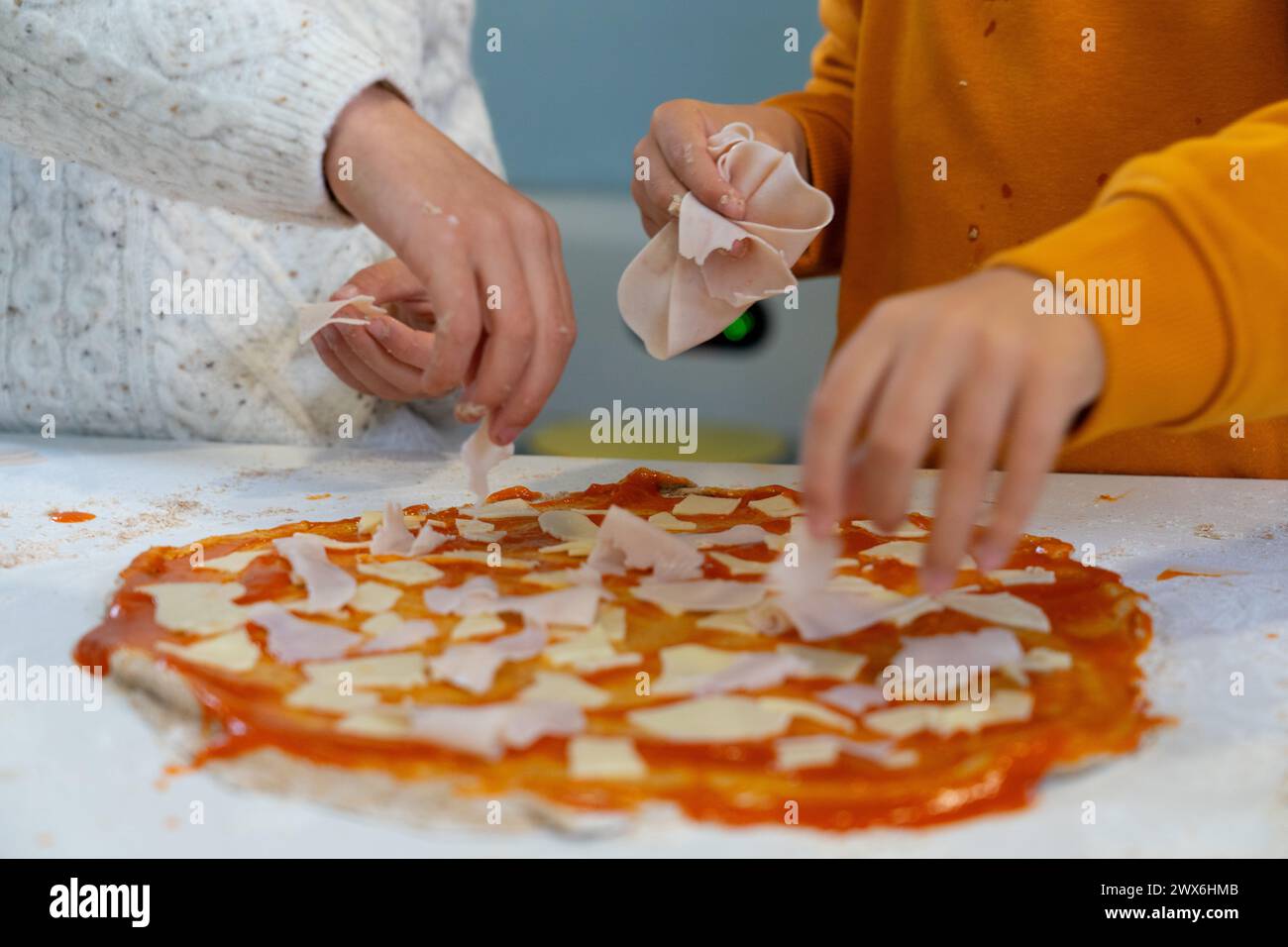 Children hands cooking pizza Stock Photo - Alamy