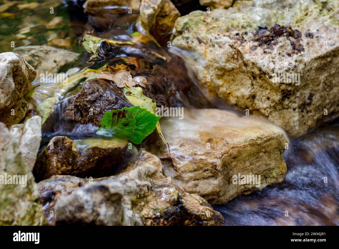 Water running over stones hi-res stock photography and images - Alamy
