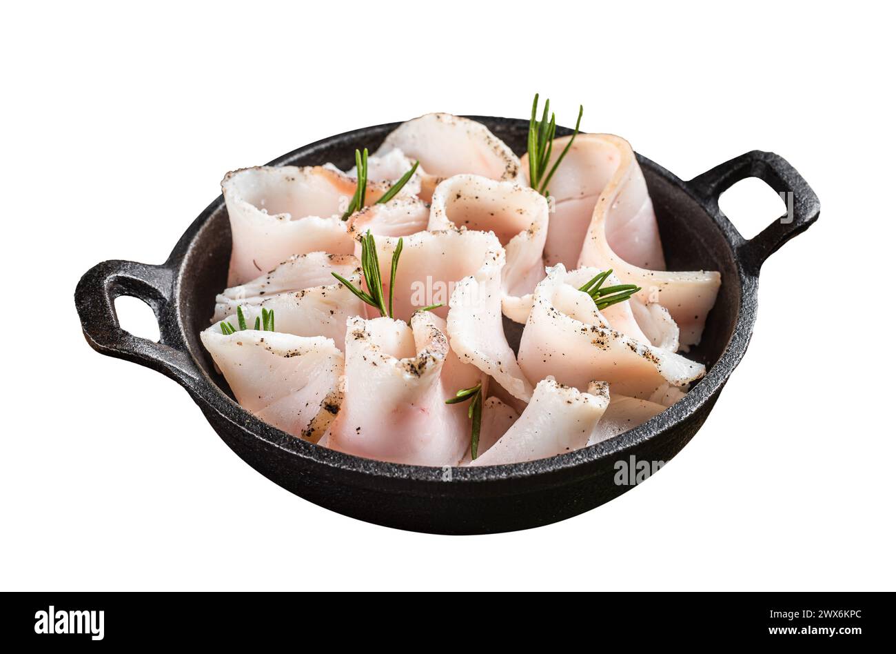 Fresh sliced lard with salt, garlic and pepper in pan with herbs ...