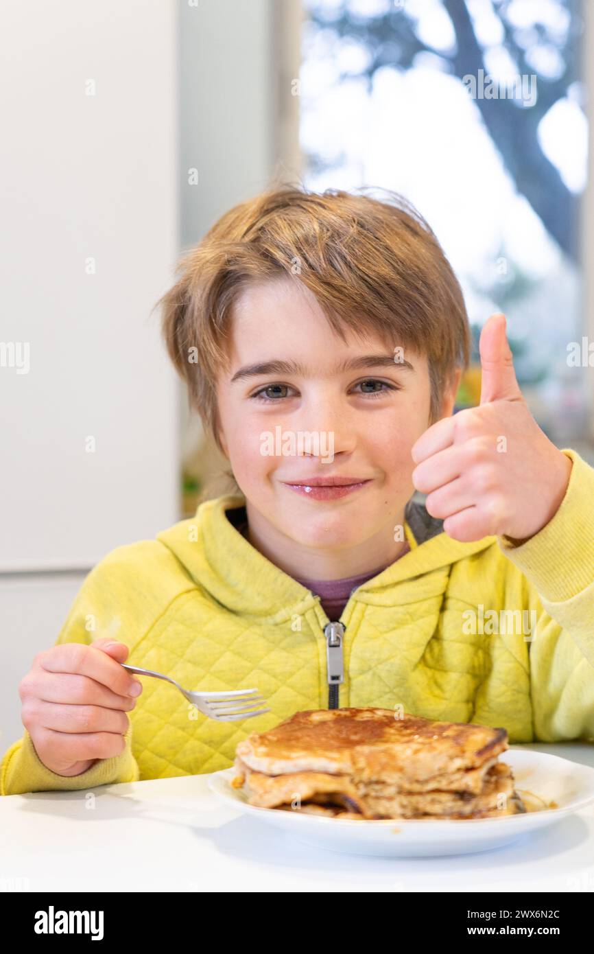 Boy Eating Pancakes Village Boy Eating Pancakes With Wooden Fork In An