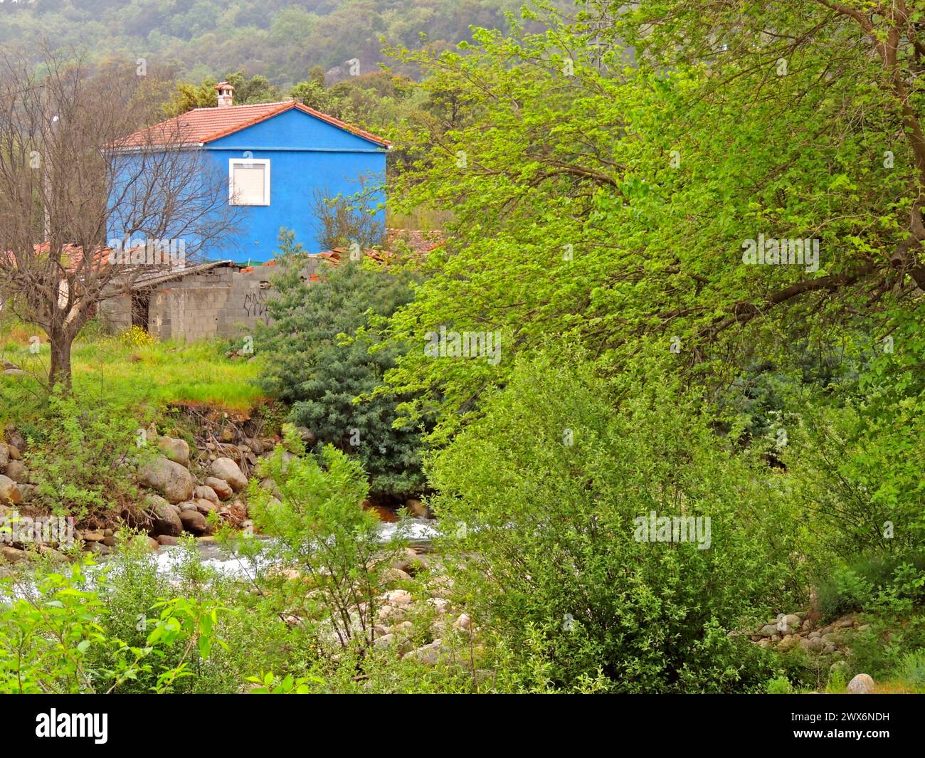 Walking along the cause of the Garganta Santa Maria river, in Candeleda ...