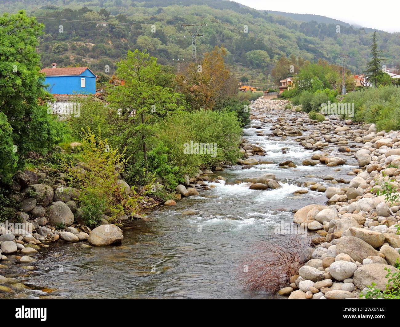 Walking along the cause of the Garganta Santa Maria river, in Candeleda ...