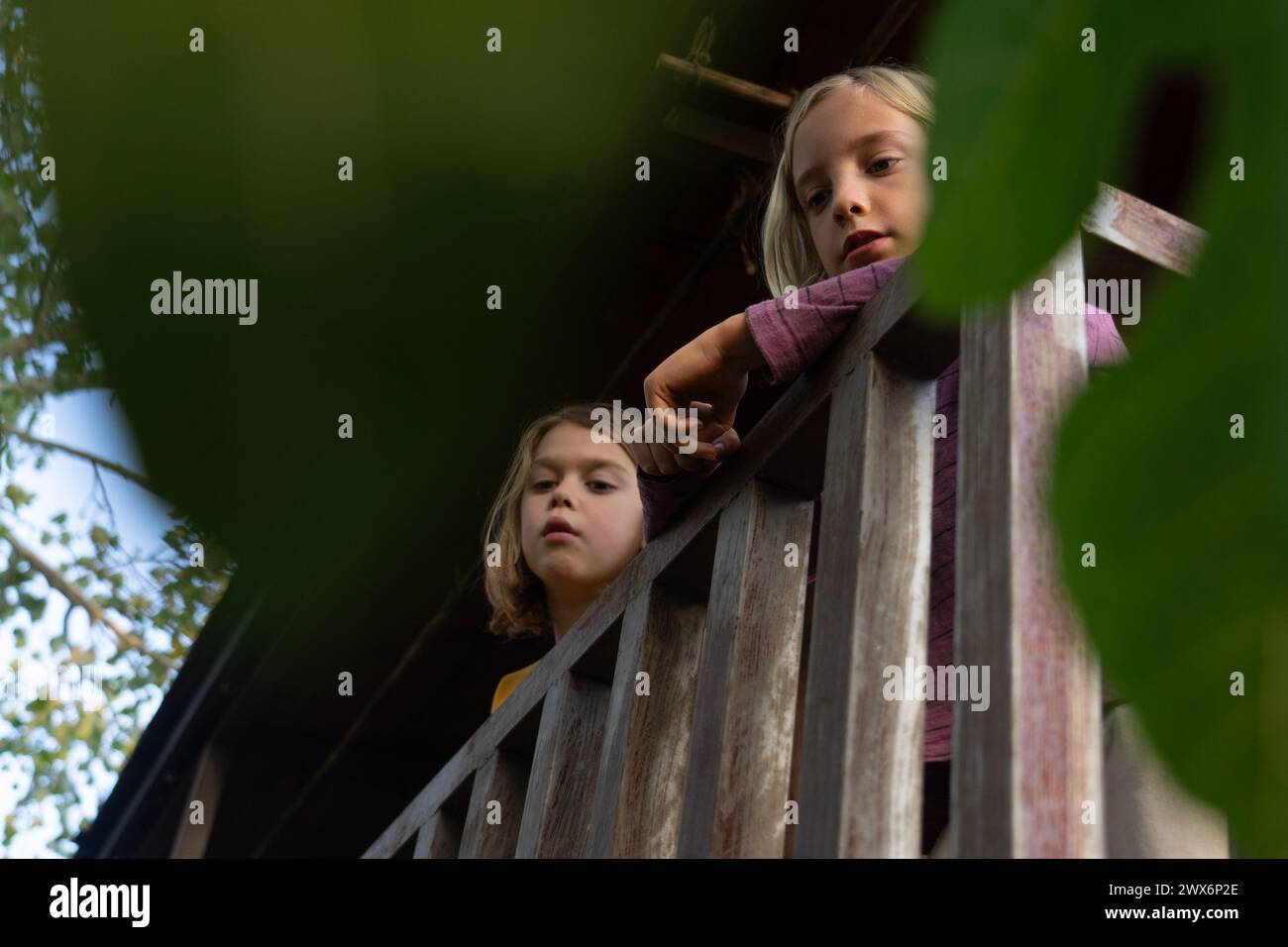 Leaning over railing hi-res stock photography and images - Alamy