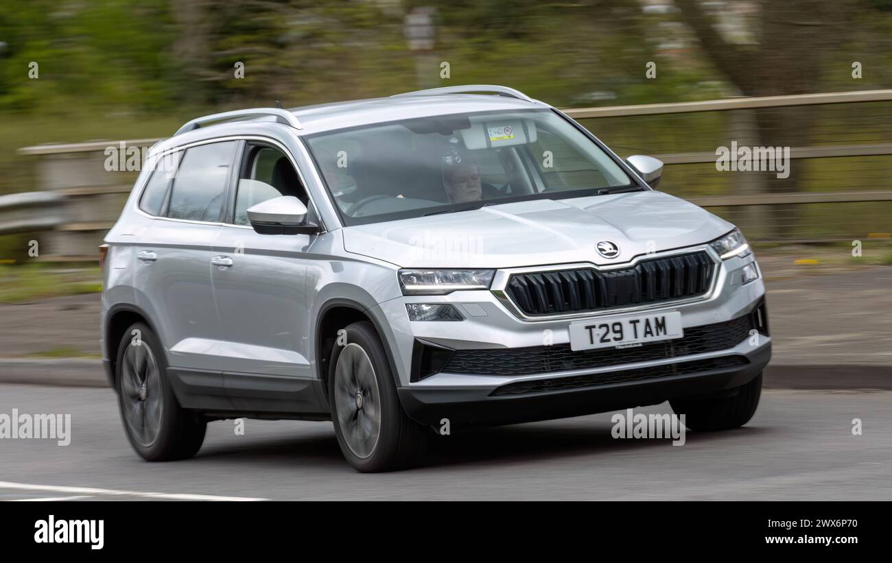 Milton Keynes,UK-Mar 26th 2024: 2023 silver Skoda Karoq car driving on ...