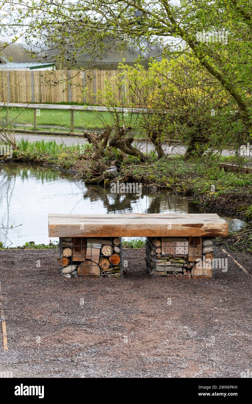Chunky benches made with gabions filled with insect friendly materials ...