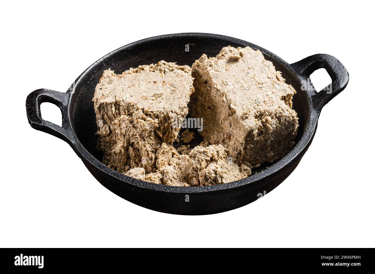 Halva with sunflower seeds and honey in pan. Isolated on white background. Top view Stock Photo ...