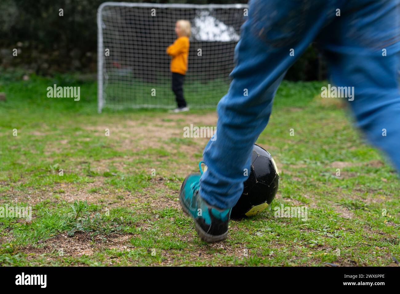 Kids playing soccer garden hi-res stock photography and images - Alamy