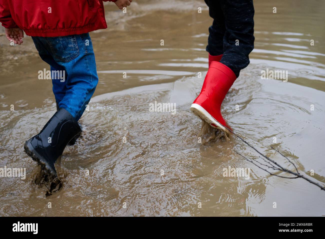 Muddy wellies kids hi-res stock photography and images - Alamy