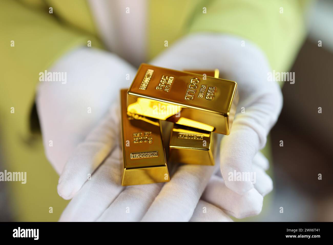 Gold bars in hand hi-res stock photography and images - Alamy