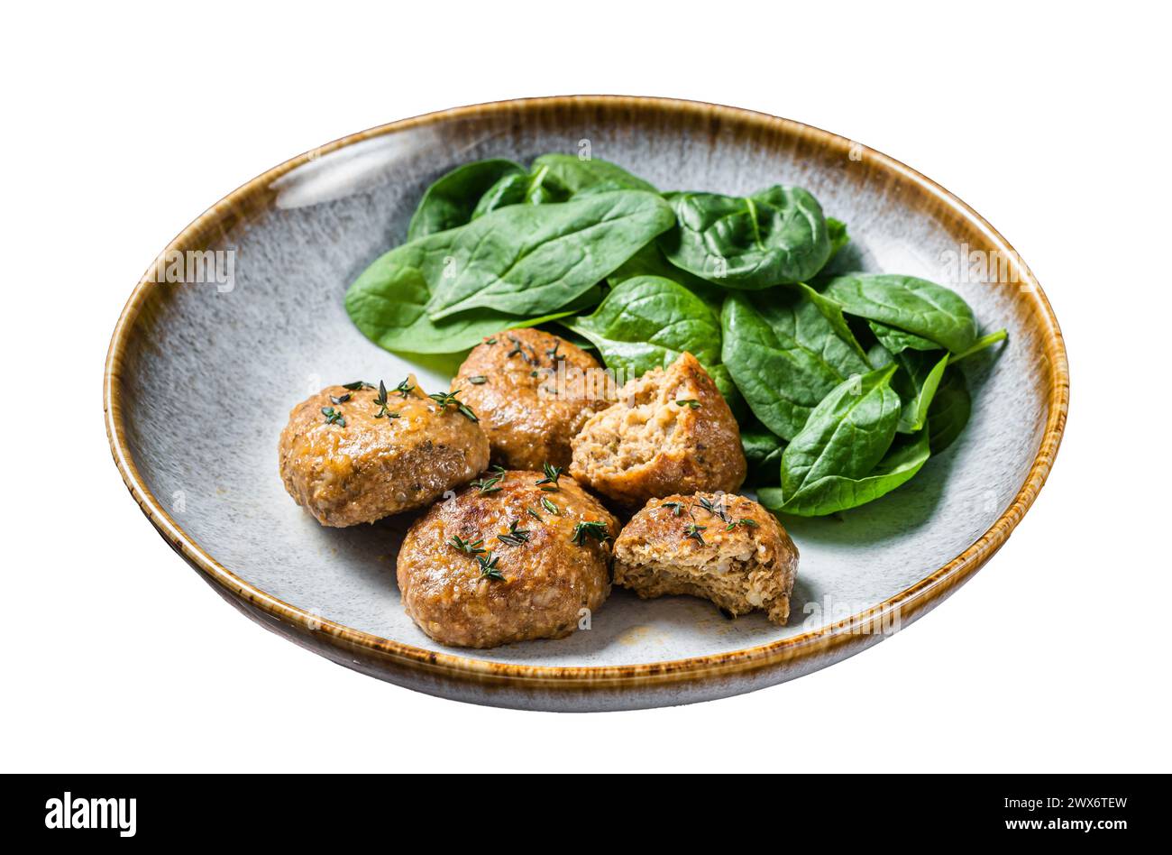 Fish Cakes or Fish balls with tuna and spinach in a plate. Isolated on ...