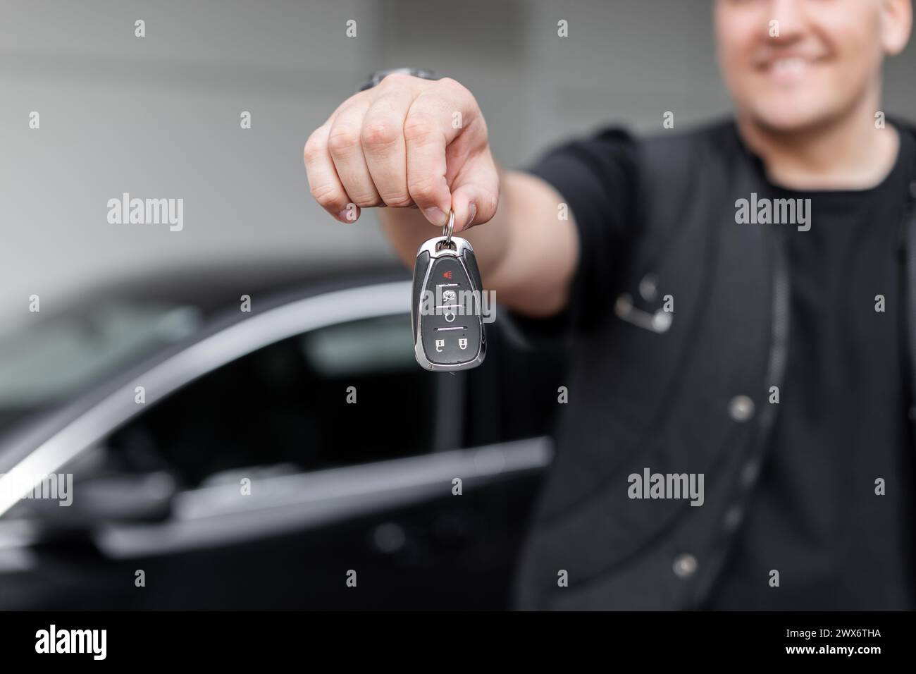 Happy Man Holding And Giving Car Keys. Arneda Auto. Sale Of Transport ...